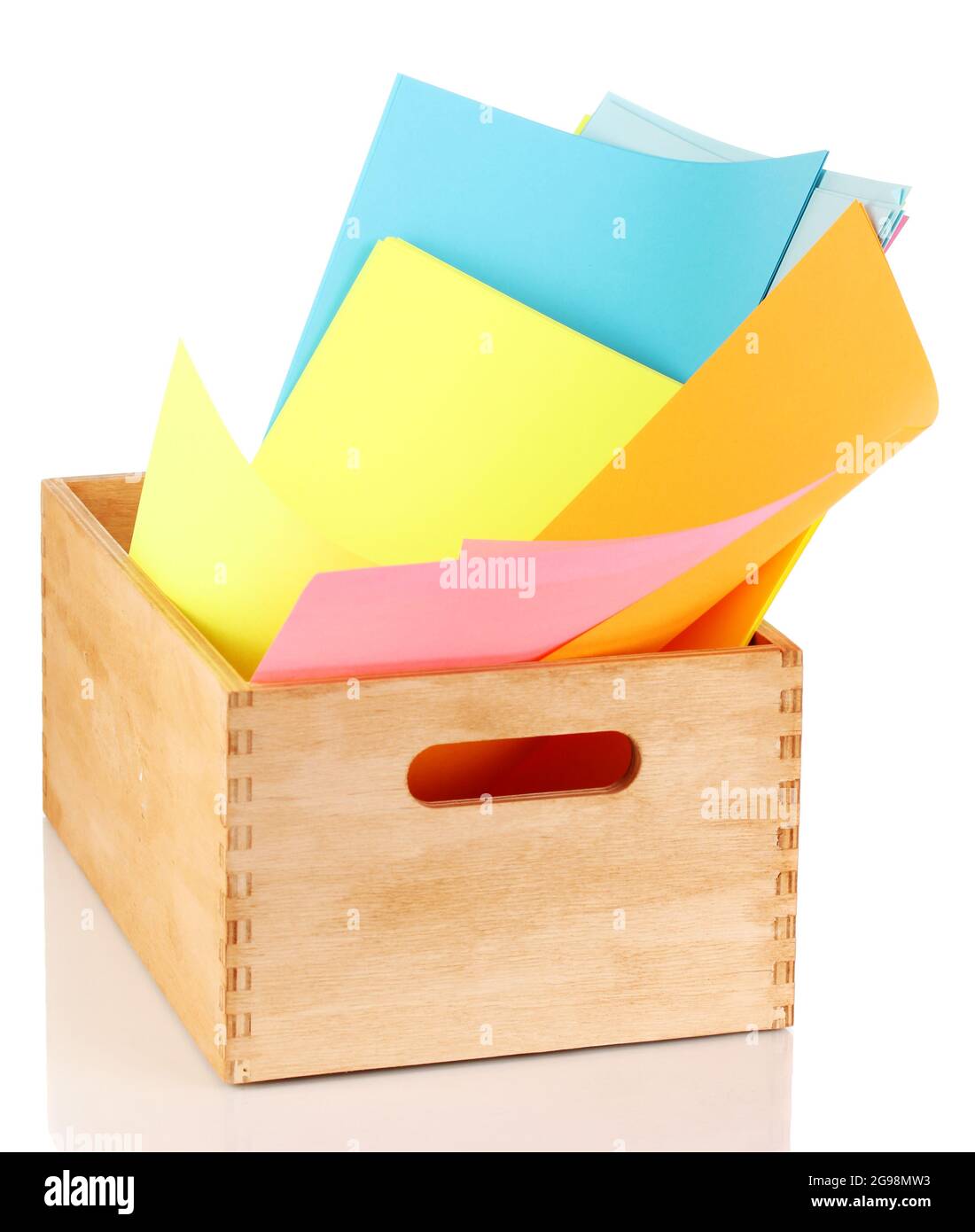 Wooden crate with colorful papers isolated on white Stock Photo - Alamy