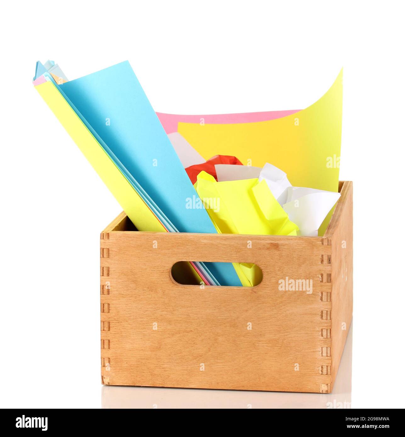 Wooden crate with colorful papers isolated on white Stock Photo - Alamy