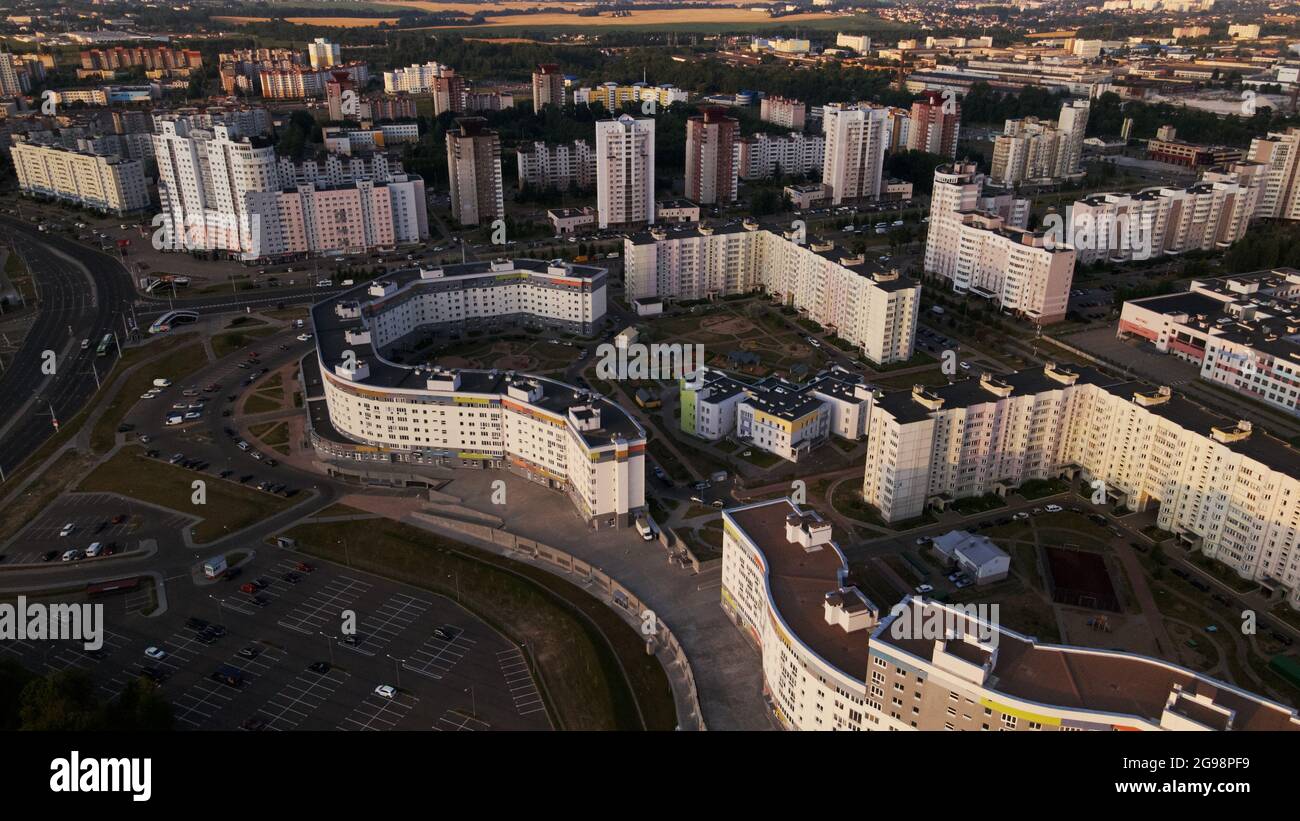 City block. Multi-storey buildings. City landscape at sunrise. Aerial ...