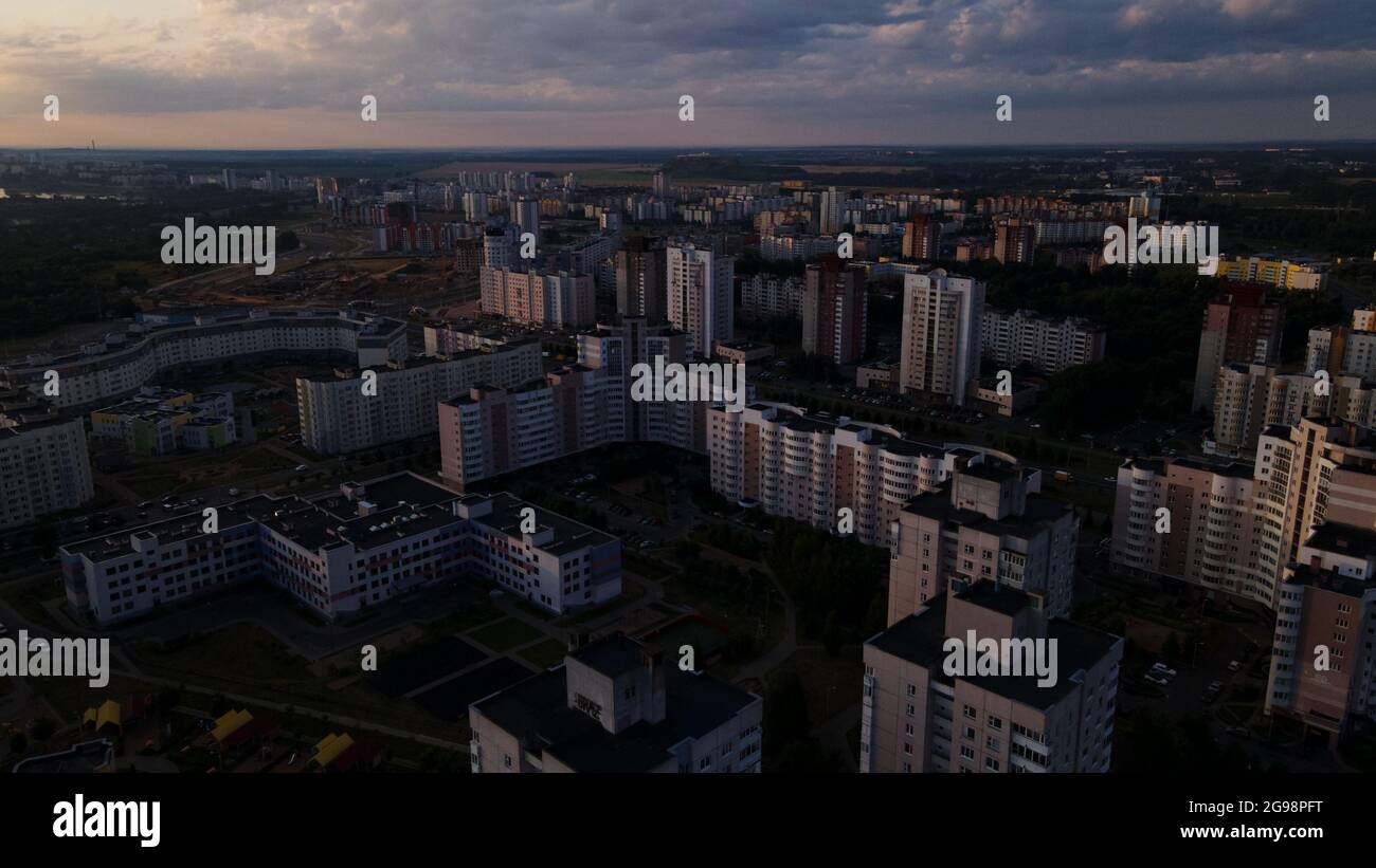 City block. Multi-storey buildings. City landscape at sunrise. Aerial ...