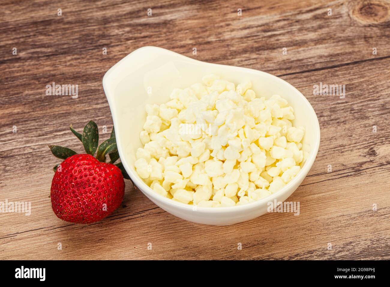 Dietary food - grain cottage cheese in the bowl Stock Photo - Alamy