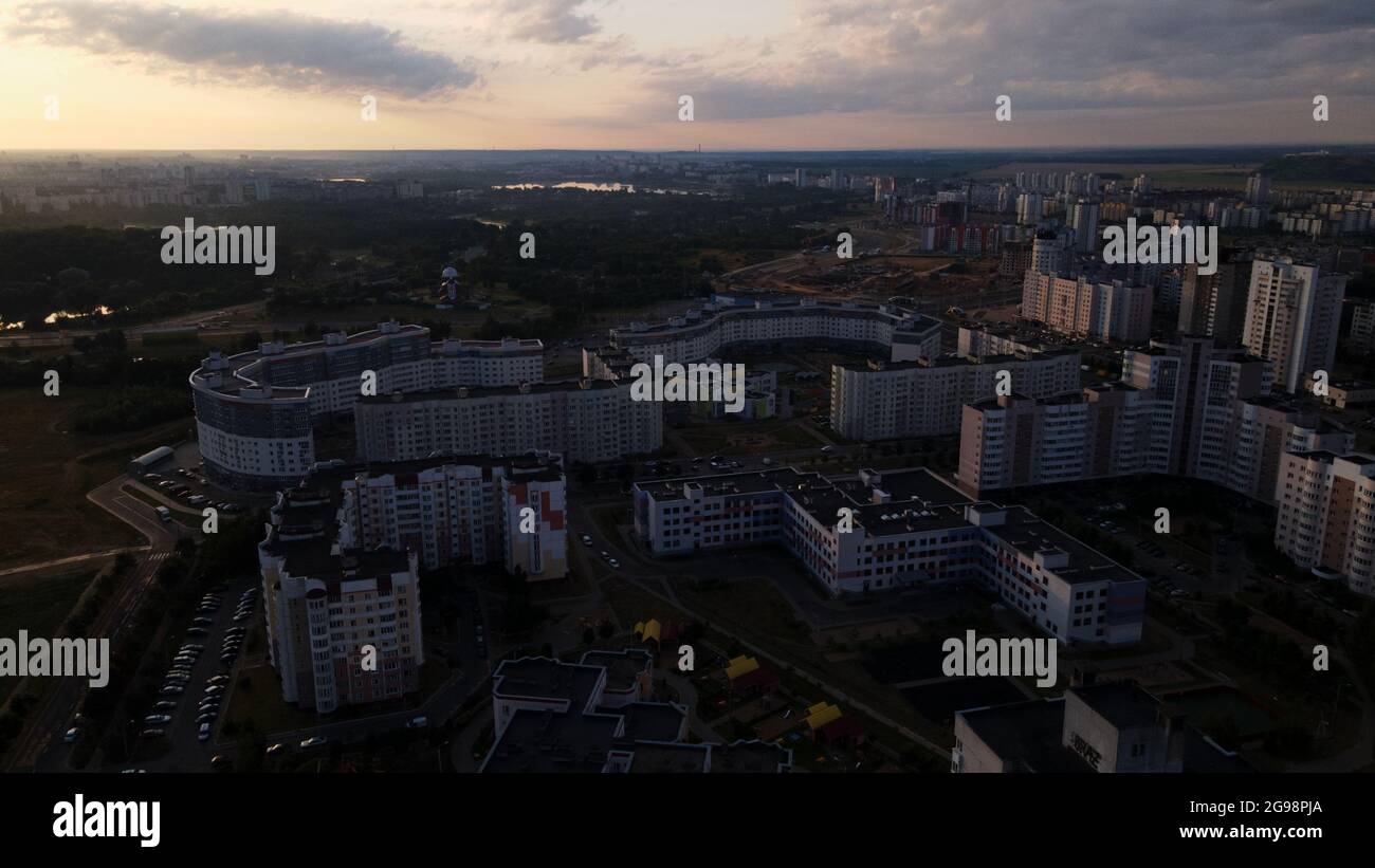 City block. Multi-storey buildings. City landscape at sunrise. Aerial ...