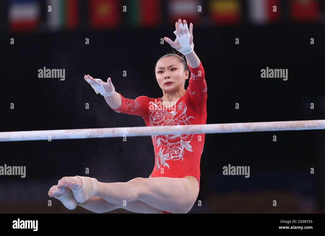 Tokyo, Japan. 25th July, 2021. Lu Yufei of China performs on the uneven ...