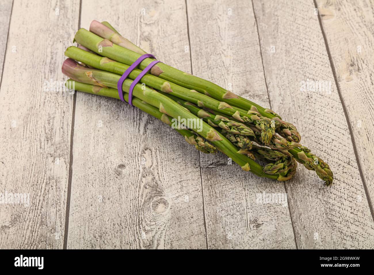 Vegan cuisine - Raw asparagus heap for cooking Stock Photo - Alamy