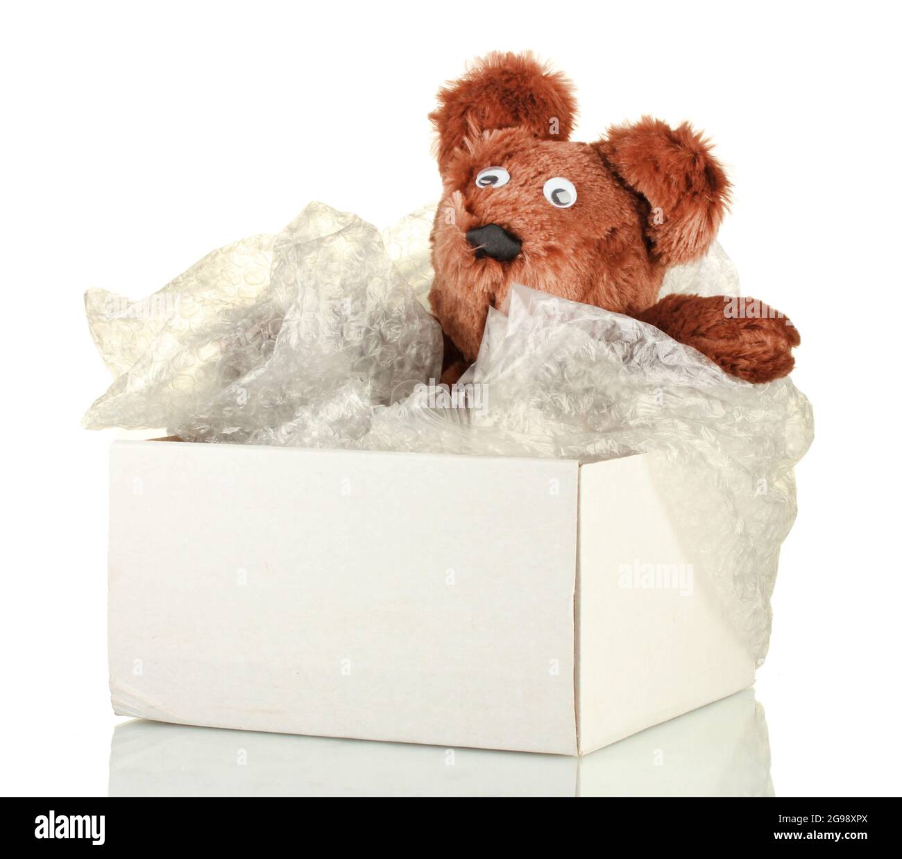 Opened parcel with a child's toy isolated on white Stock Photo - Alamy