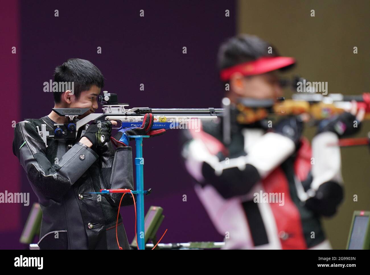 Tokyo, Japan. 25th July, 2021. Sheng Lihao (L) of China competes during ...