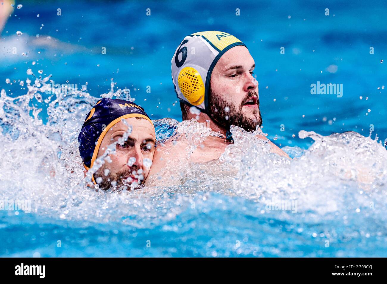 TOKYO, JAPAN - JULY 25: Vlado Popadic of Montenegro, Lachlan Edwards of ...