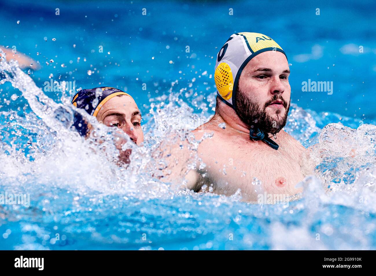 TOKYO, JAPAN - JULY 25: Vlado Popadic of Montenegro, Lachlan Edwards of ...