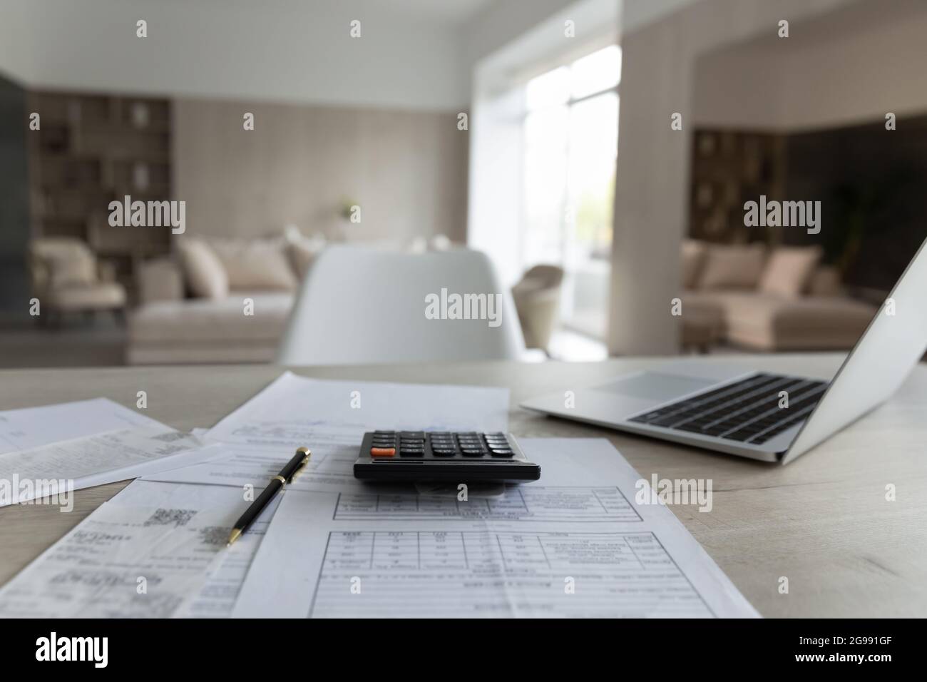 Close up of empty table with bills and documents Stock Photo - Alamy