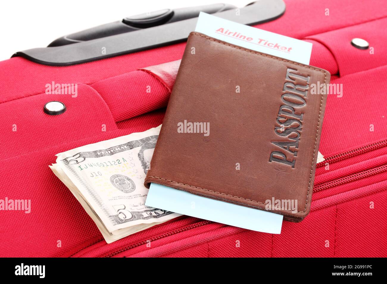 Passport and ticket on suitecase close-up Stock Photo - Alamy