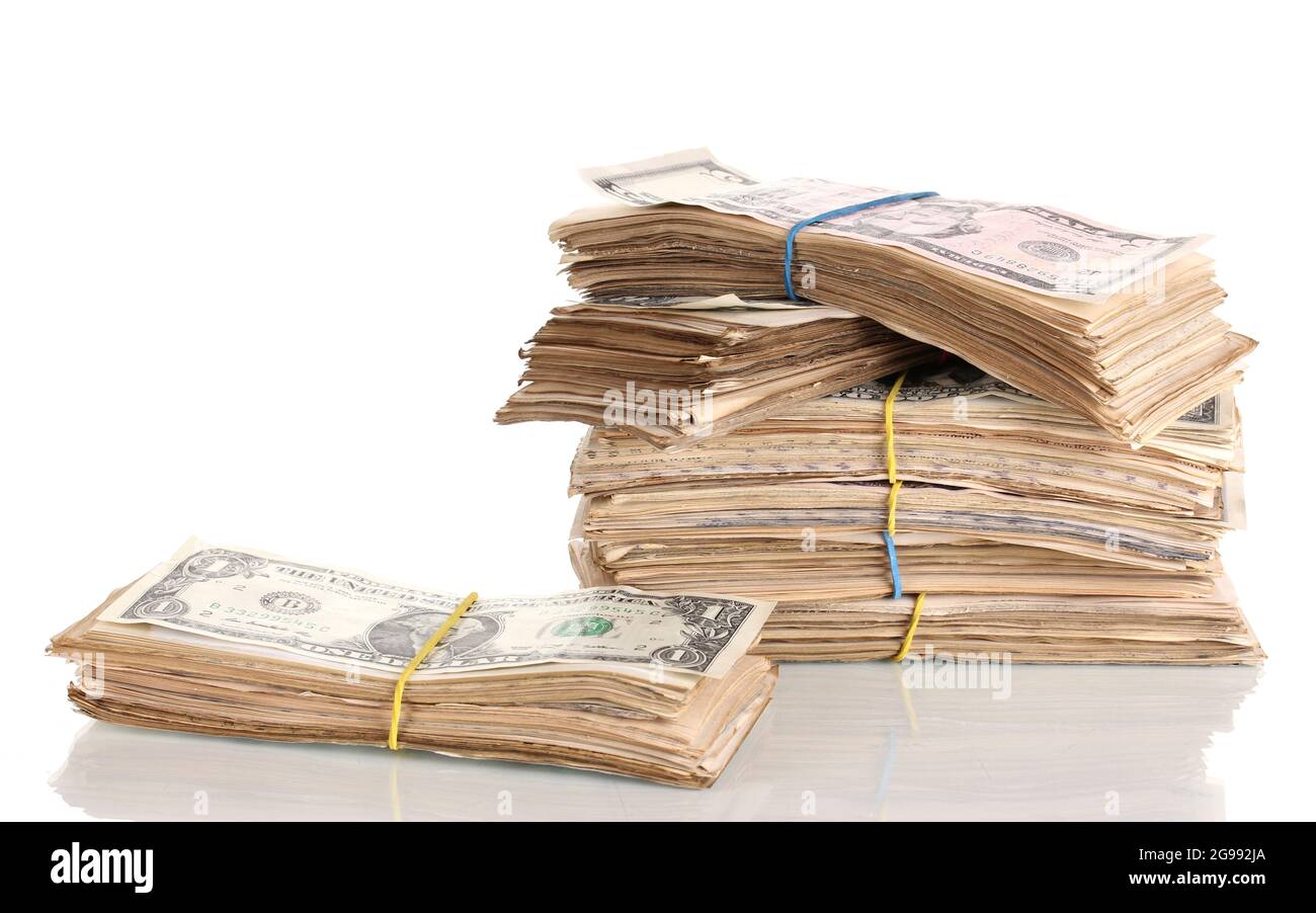 Stacks of dollars isolated on white Stock Photo - Alamy