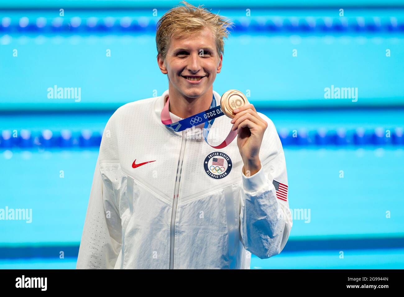 TOKYO, JAPAN - JULY 25: Chase Kalisz of United States shows his gold ...