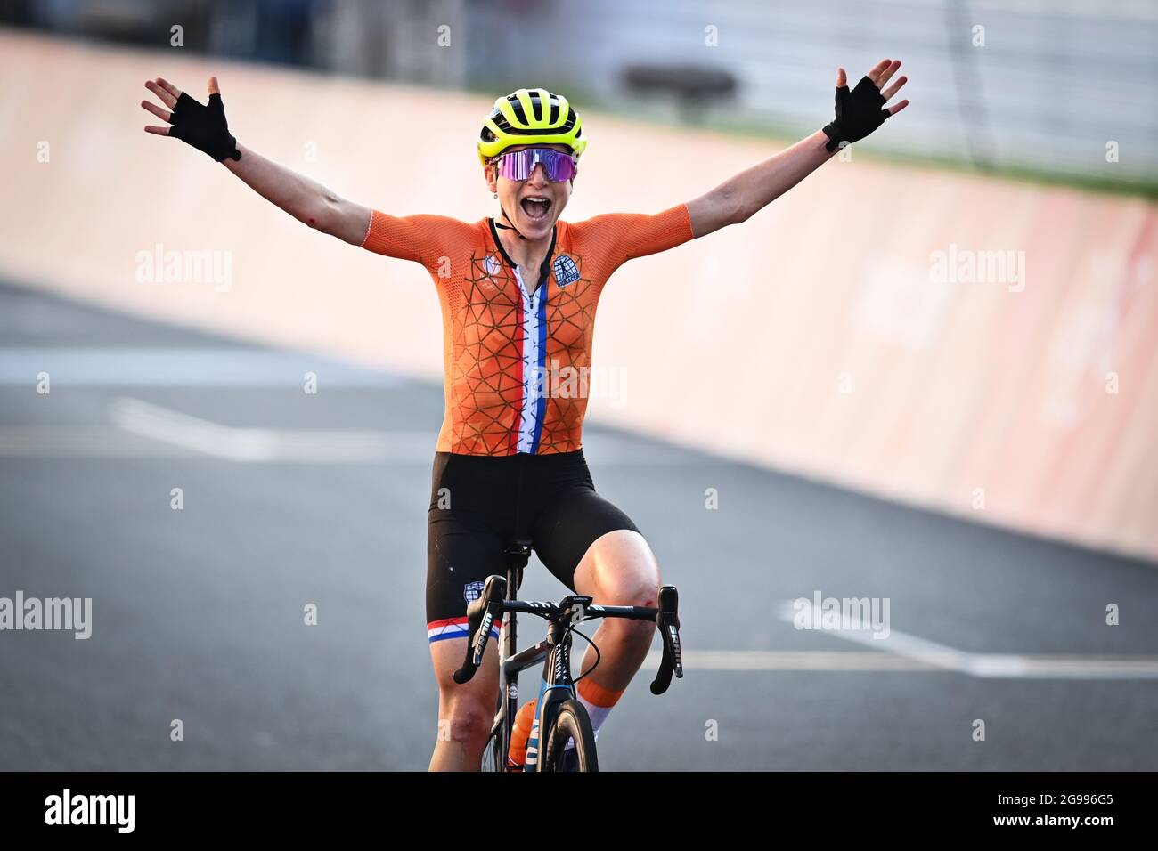 Dutch Annemiek van Vleuten celebrates as she crosses the finish line of ...