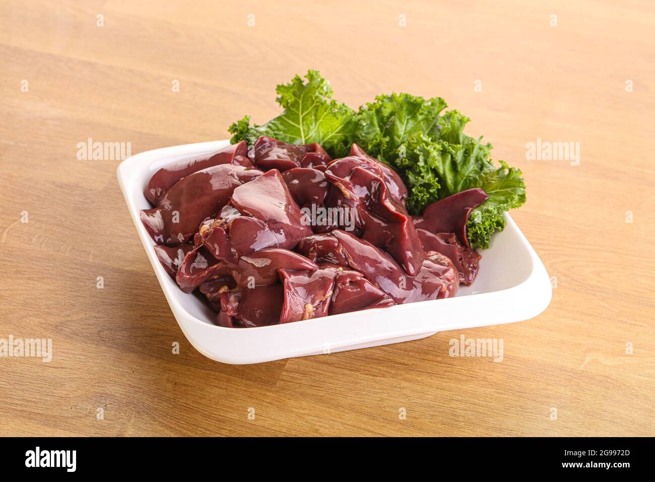 Raw chicken liver in the bowl for cooking Stock Photo - Alamy