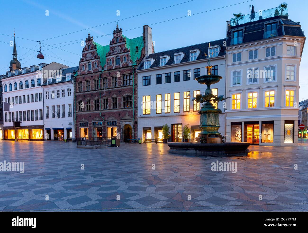 Square Amagertorv Stork fountain in night lighting at sunrise ...