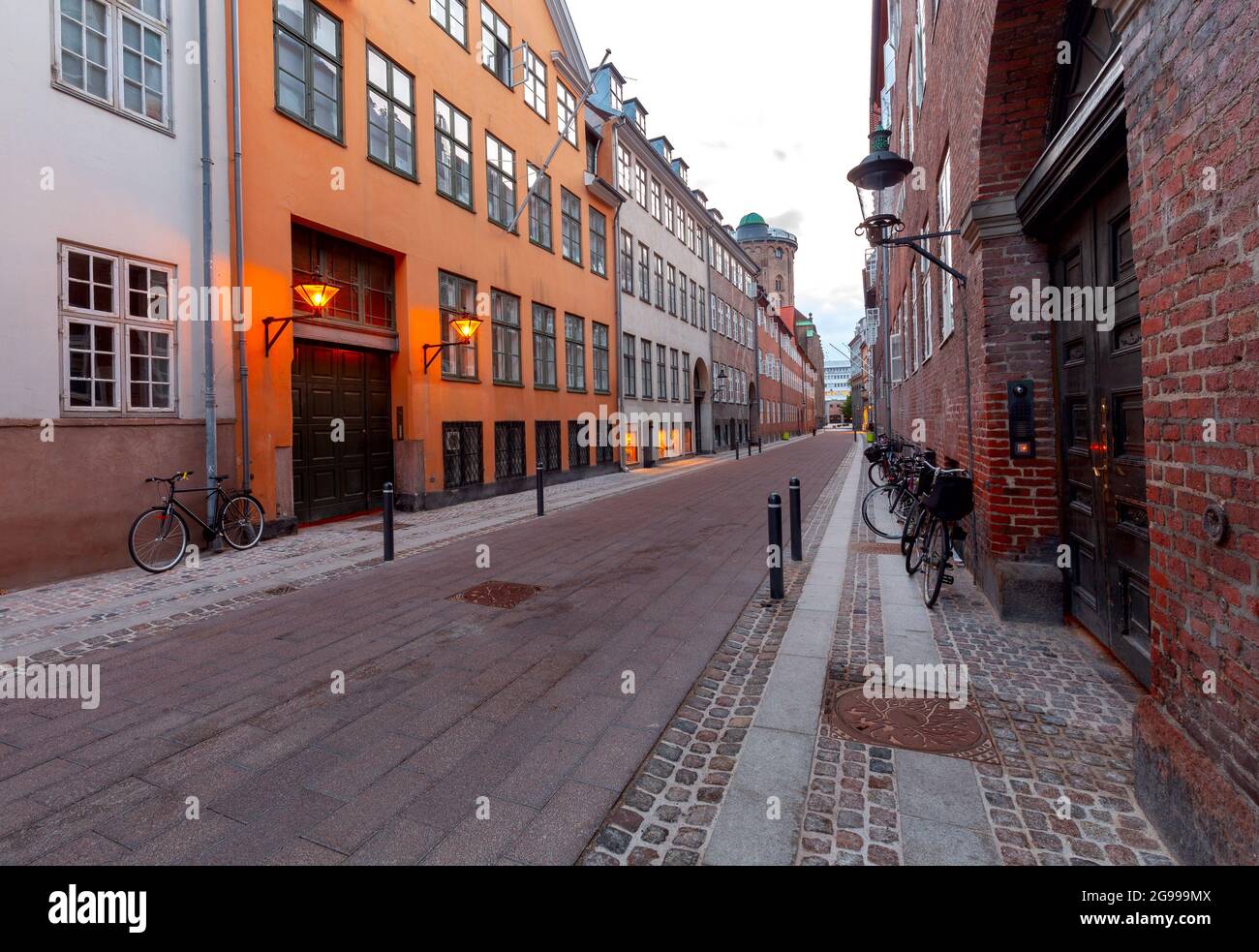 Old narrow medieval street in the early morning. Copenhagen. Denmark ...