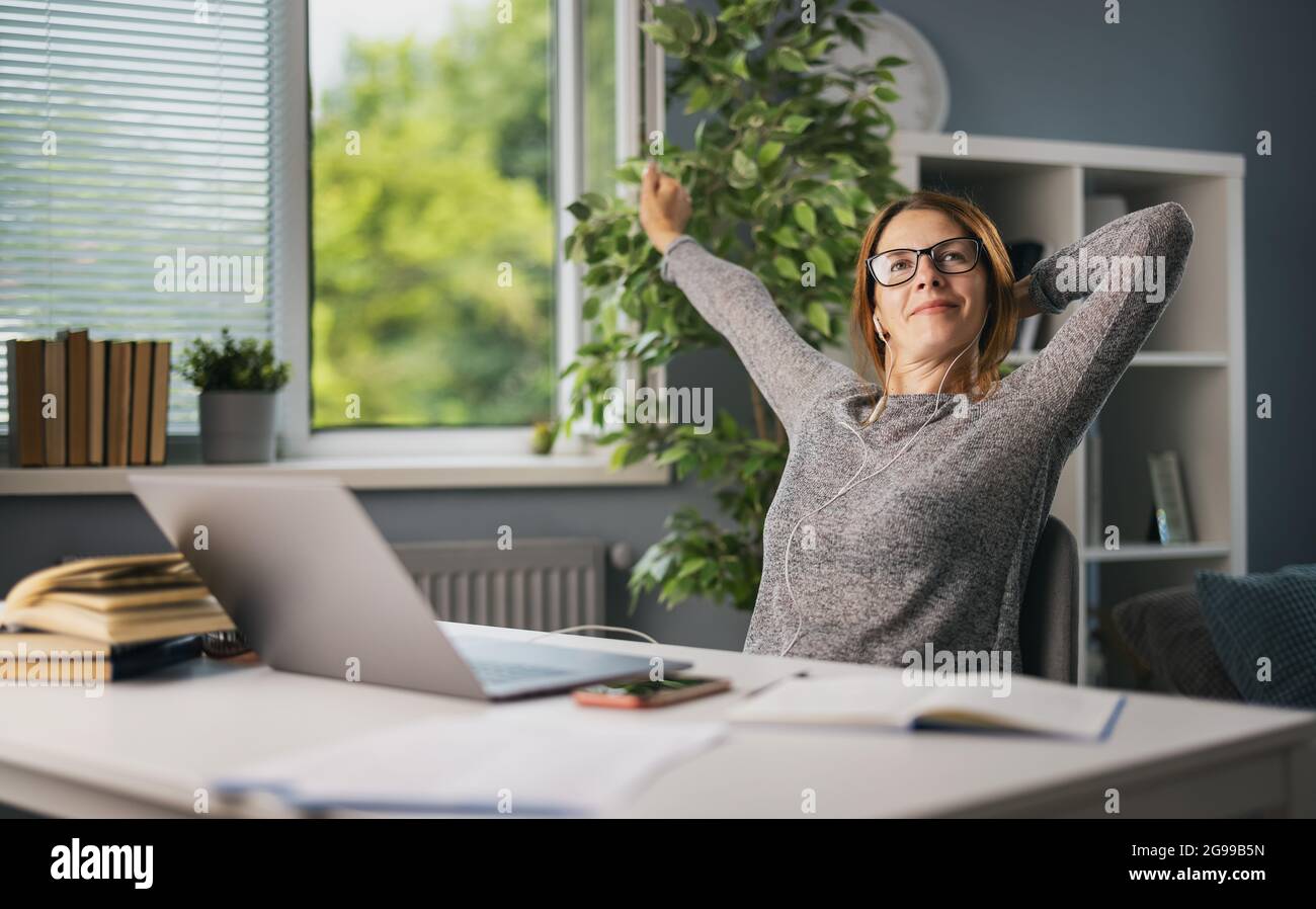 Woman relaxing after work Stock Photo - Alamy