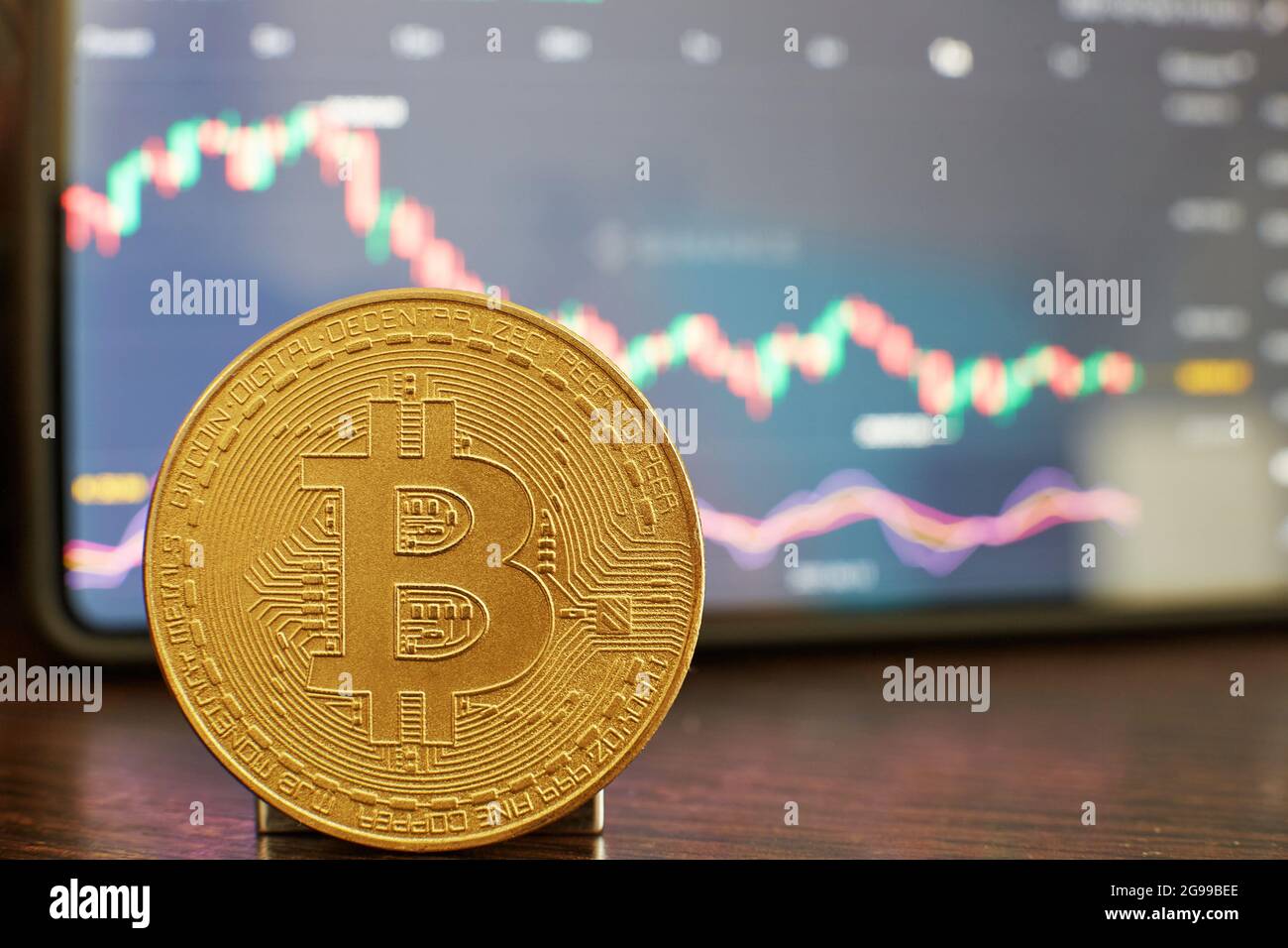 Gold bitcoins with Candle stick graph chart and digital background ...