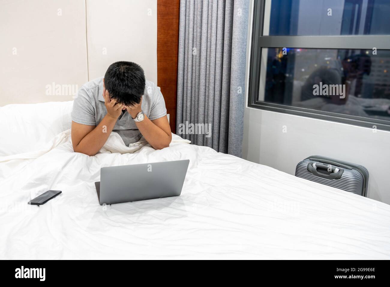 Tired businessman working late hi-res stock photography and images - Alamy