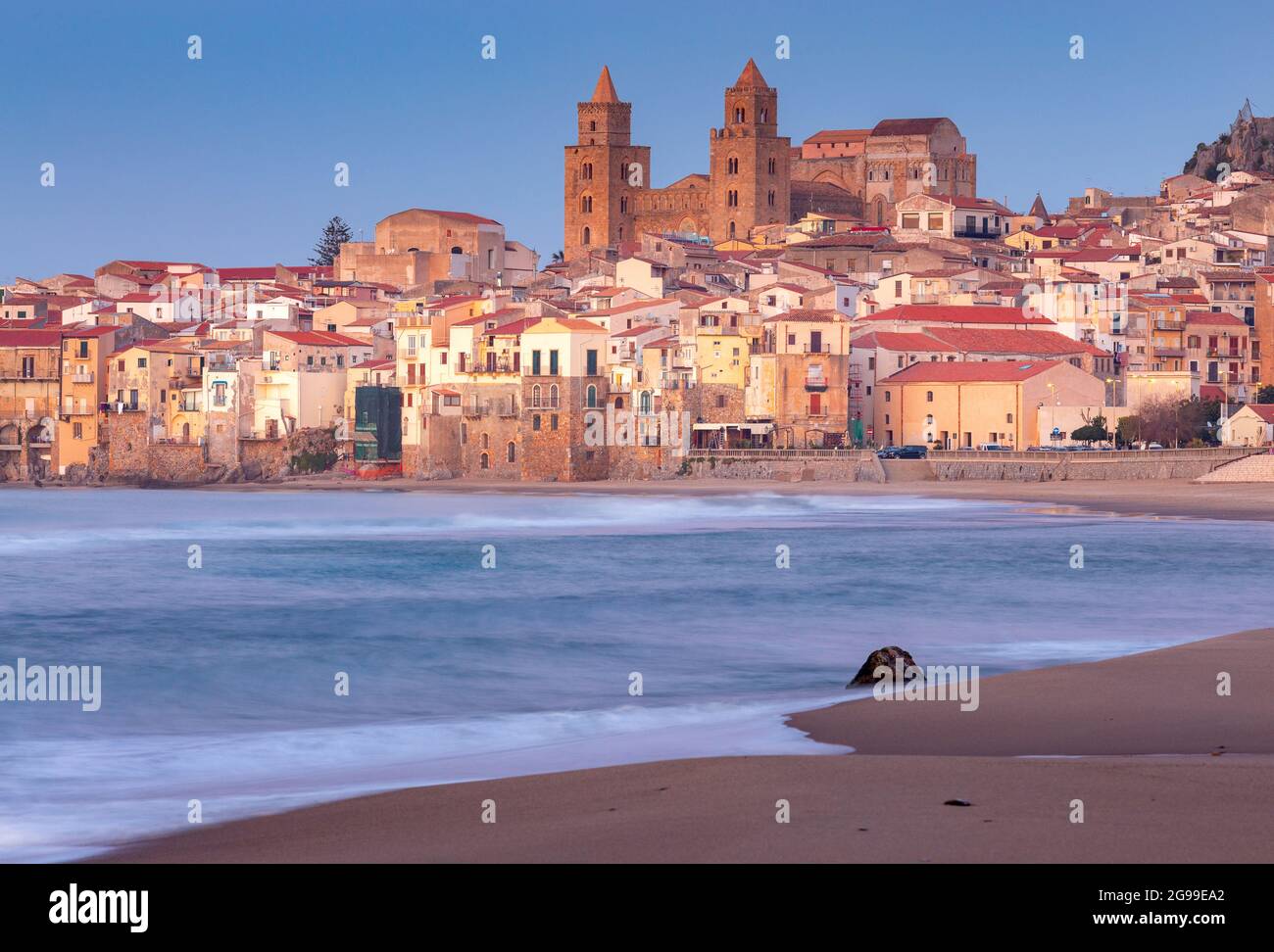 City Embankment and the Cathedral in old medieval town Cefalu at sunset ...