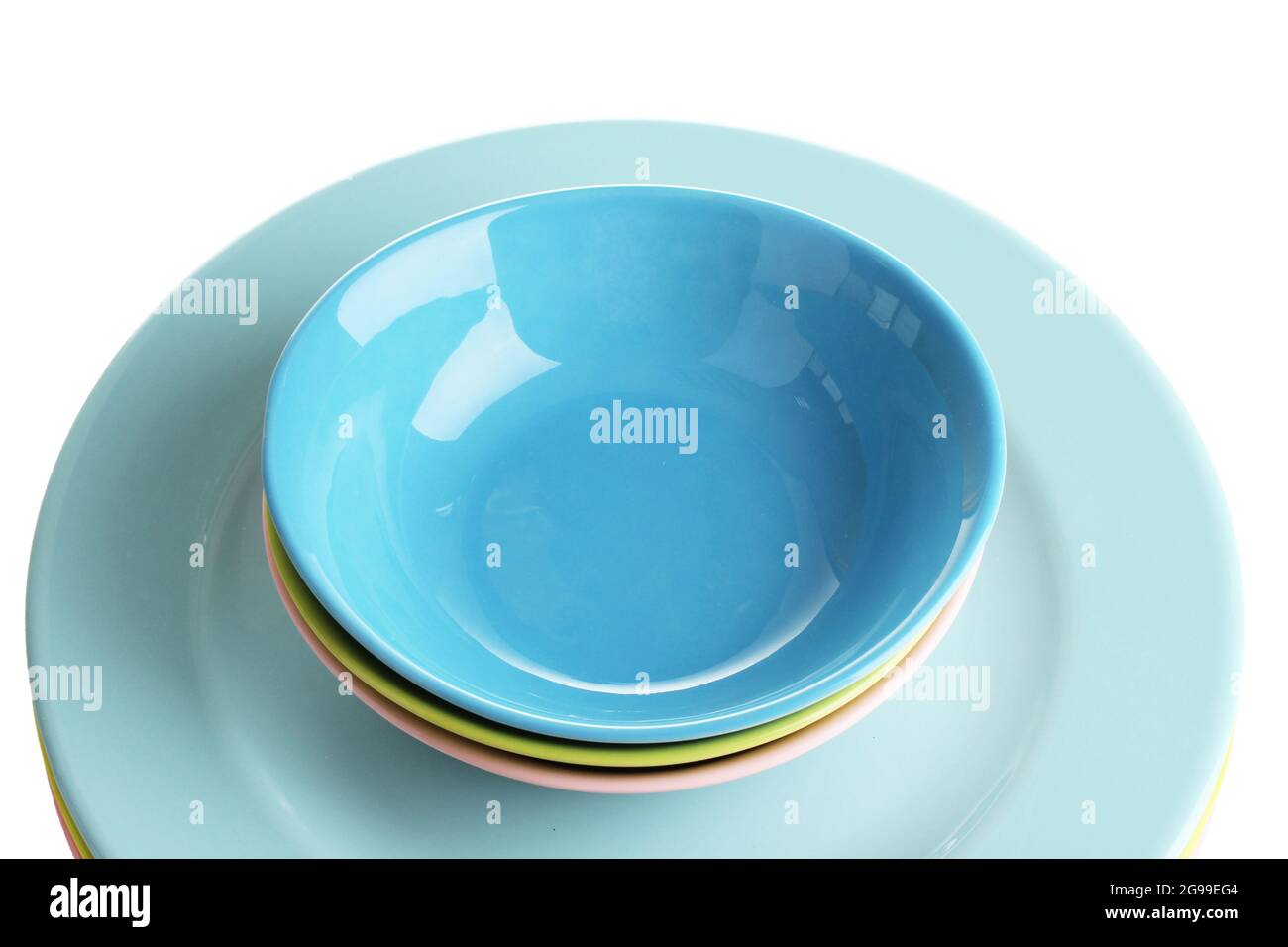 Colorful plates close-up isolated on white Stock Photo - Alamy