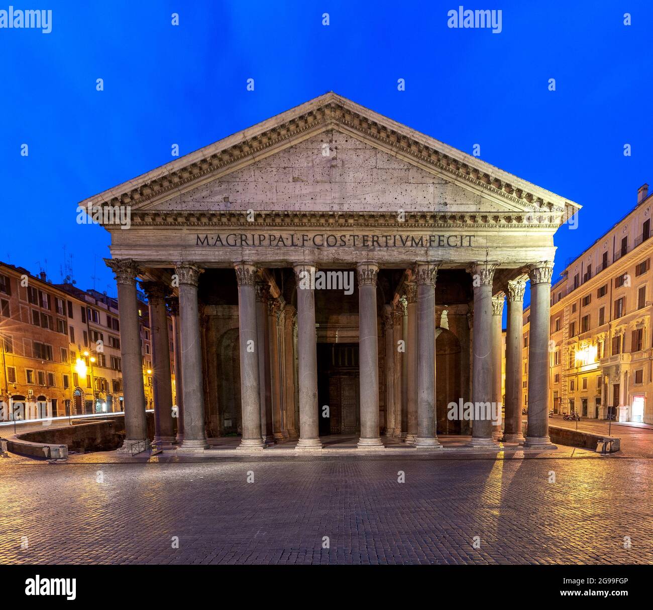 View of the facade and colonnade of the Pantheon in the early morning ...