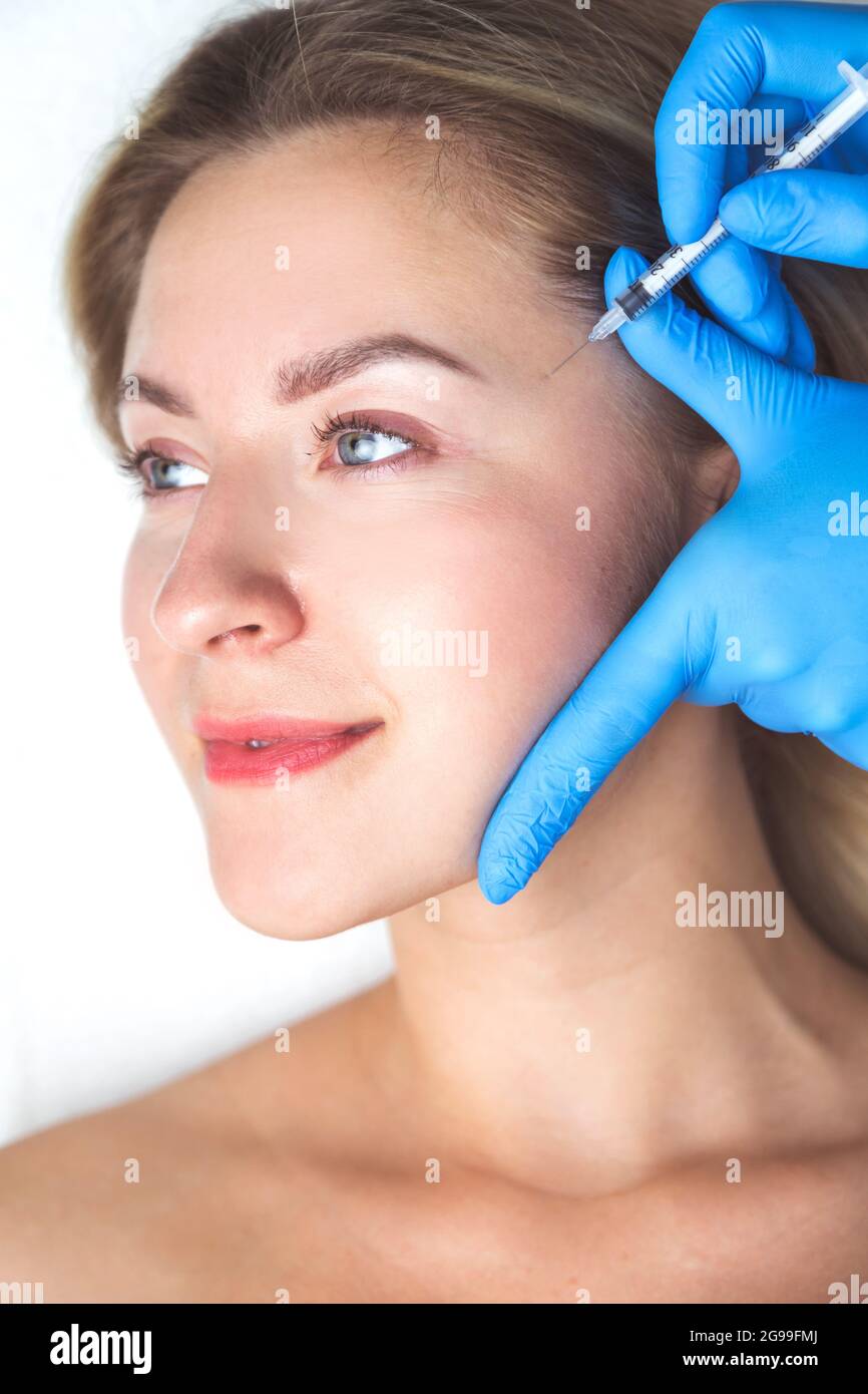 Rejuvenating facial injections procedure for tightening and smoothing ...