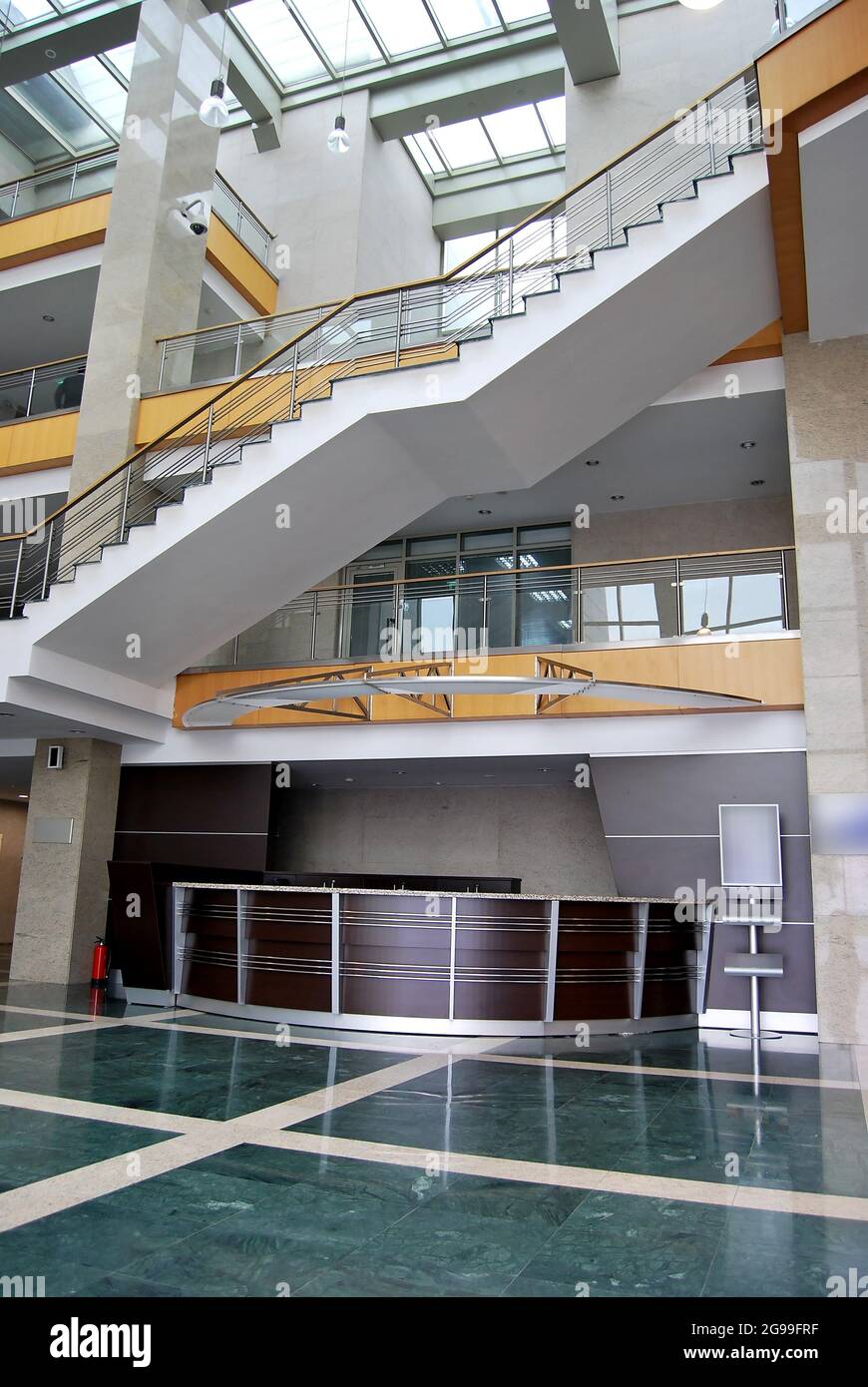Luxury building entrance, reception and marble staircase lobby, waiting ...