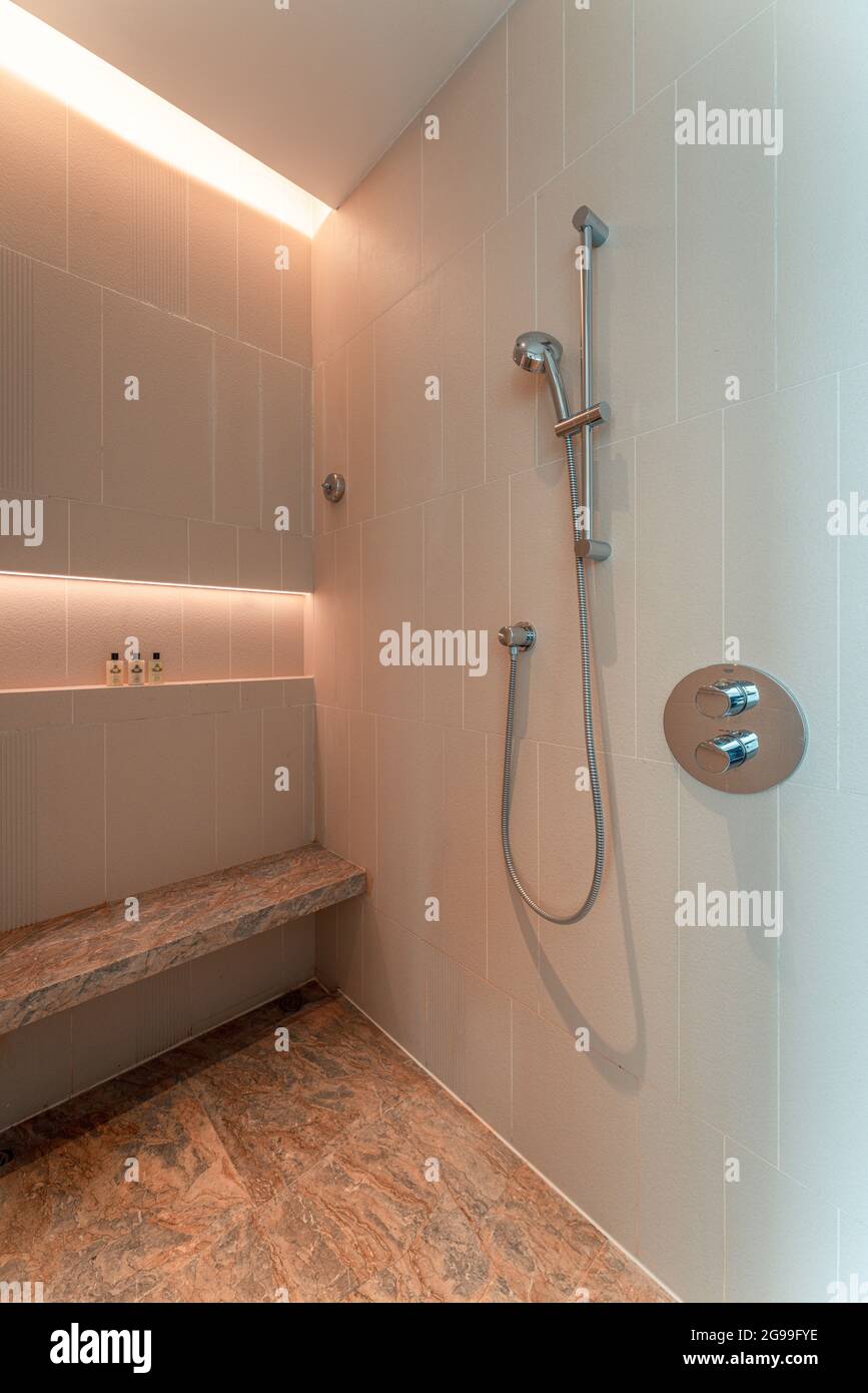 Modern hotel bathroom shower room Stock Photo - Alamy