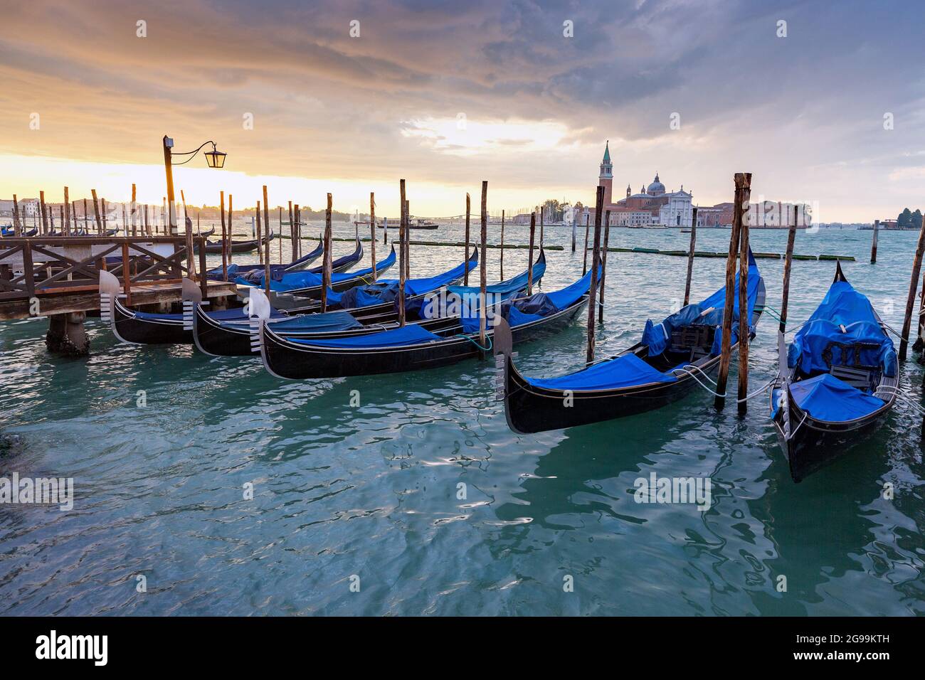 View of the Venetian lagoon and the island of St. George at sunrise ...