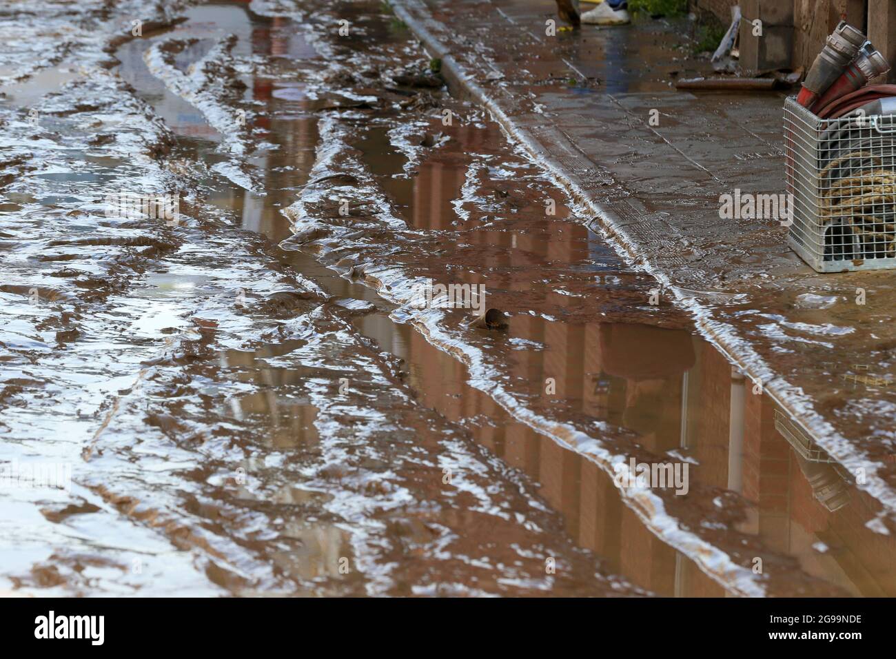 Illustration shows the mud covered street rue Pirot Pauchet, in the ...