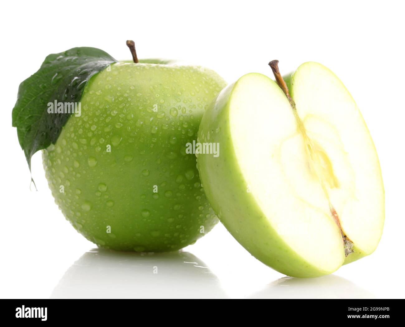 Ripe green apple with leaf and half, isolated on white Stock Photo - Alamy