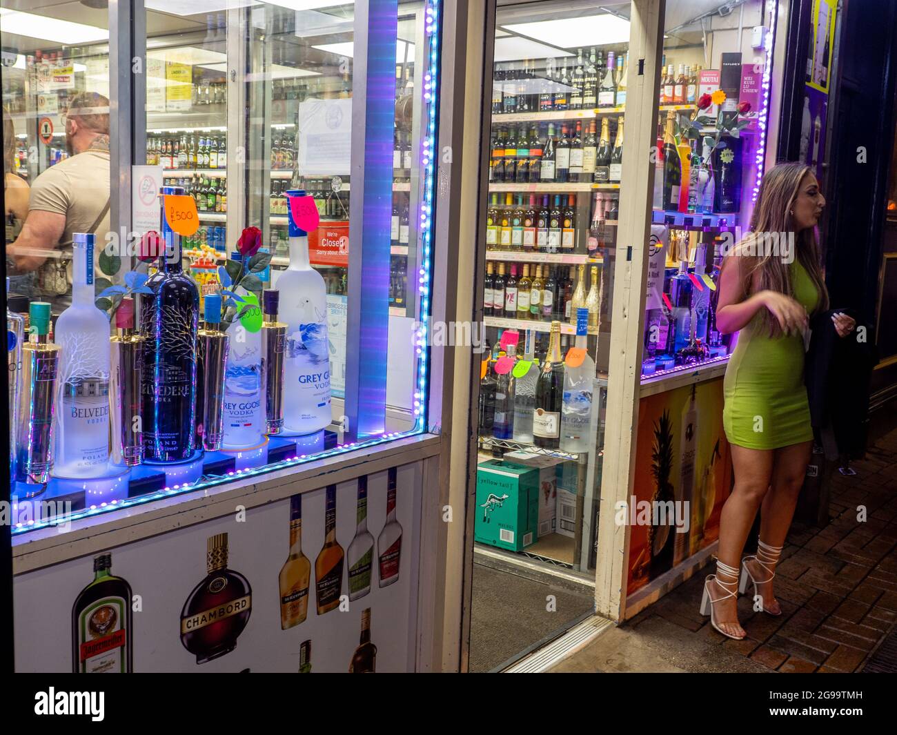 An off licence at night in the centre of Sheffield Stock Photo - Alamy
