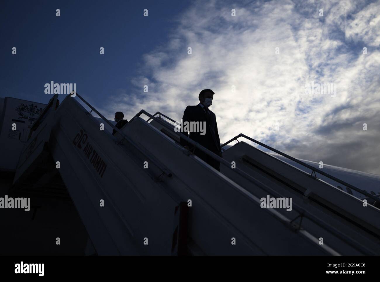 France's President Emmanuel Macron leaves his plane on the tarmac upon ...