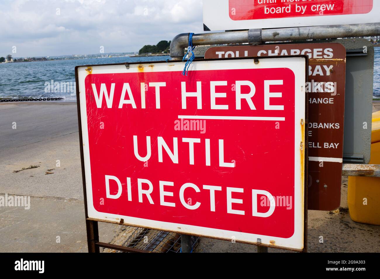 Wait here until directed sign Sandbanks to Shell Beach chain ferry ...