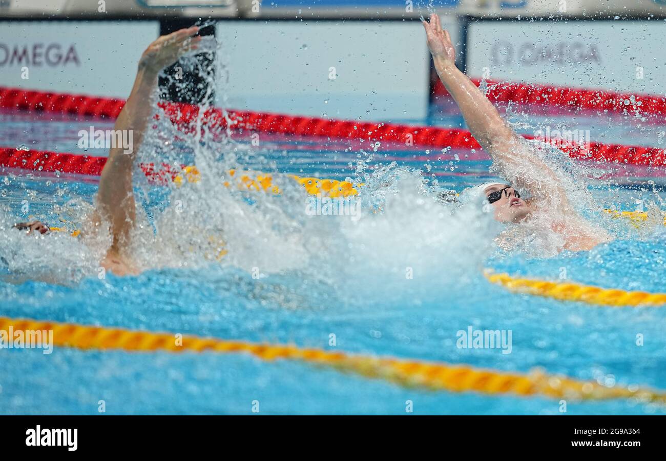 Men 100m backstroke heats hi-res stock photography and images - Alamy