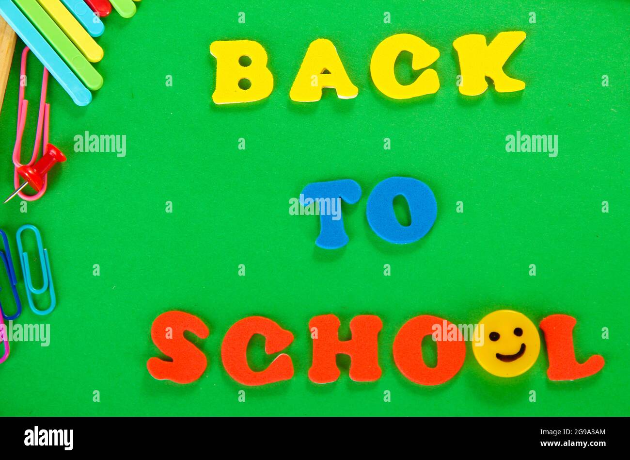 Small chalkboard with school supplies. Back to School Stock Photo - Alamy