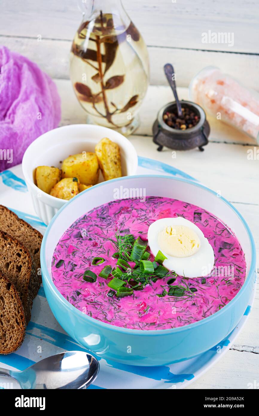 Cold borscht on white wooden background. Cold beet soup Stock Photo - Alamy