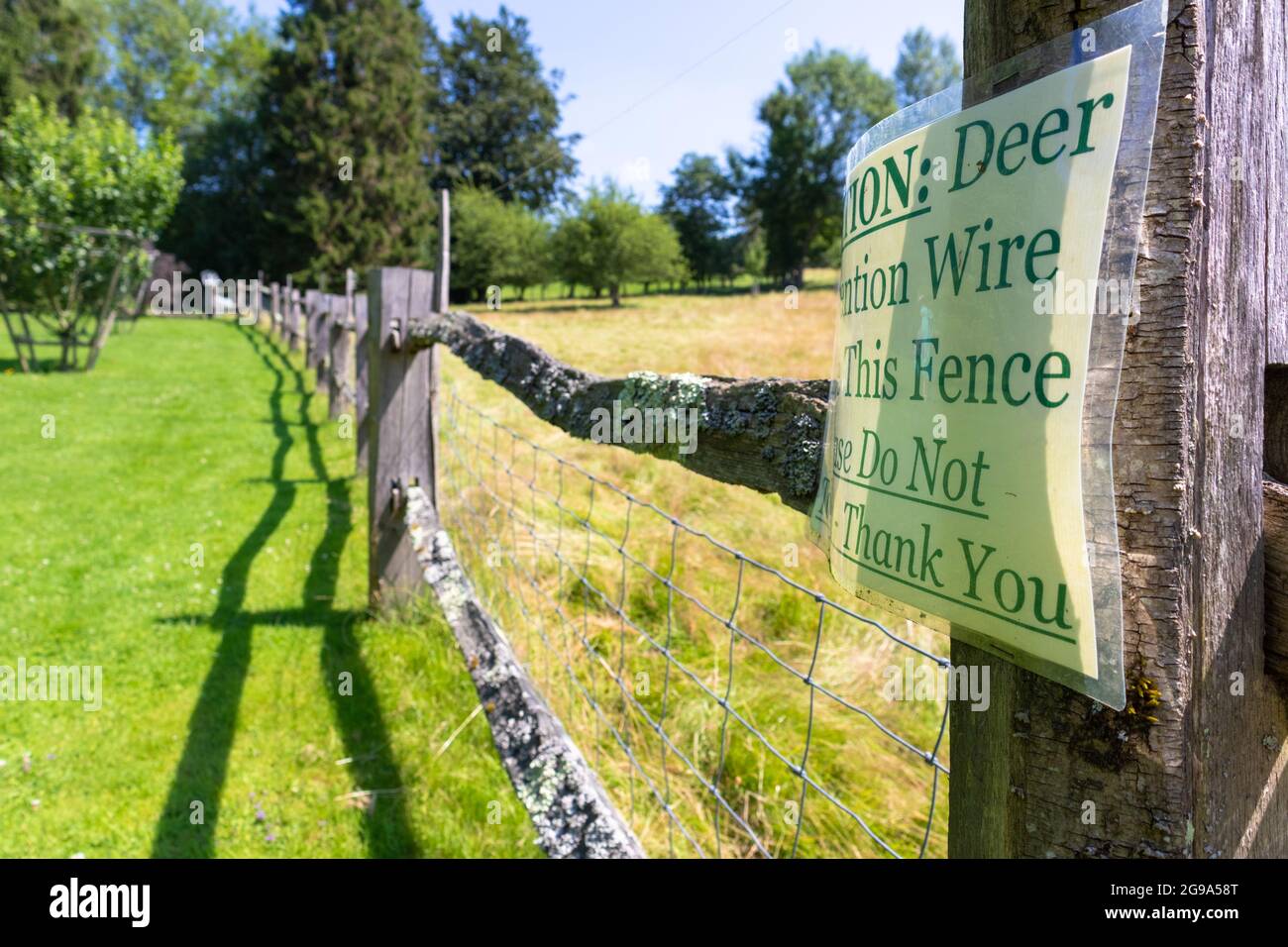 Deer prevention wire above this fence, please do not touch sign, uk ...