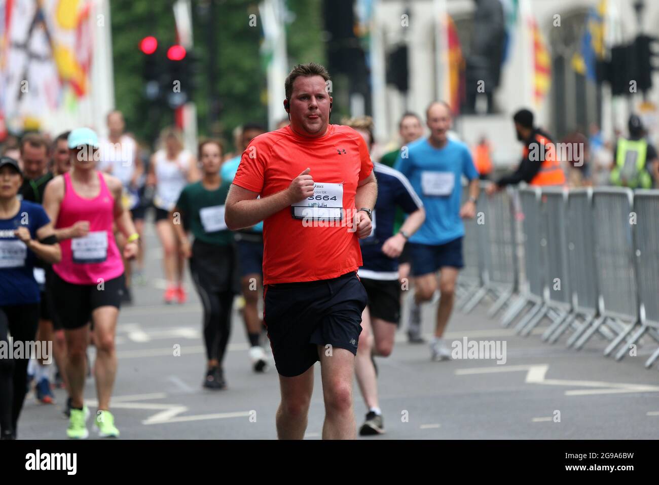 London, England, UK. 25th July, 2021. Runners in central London during ...