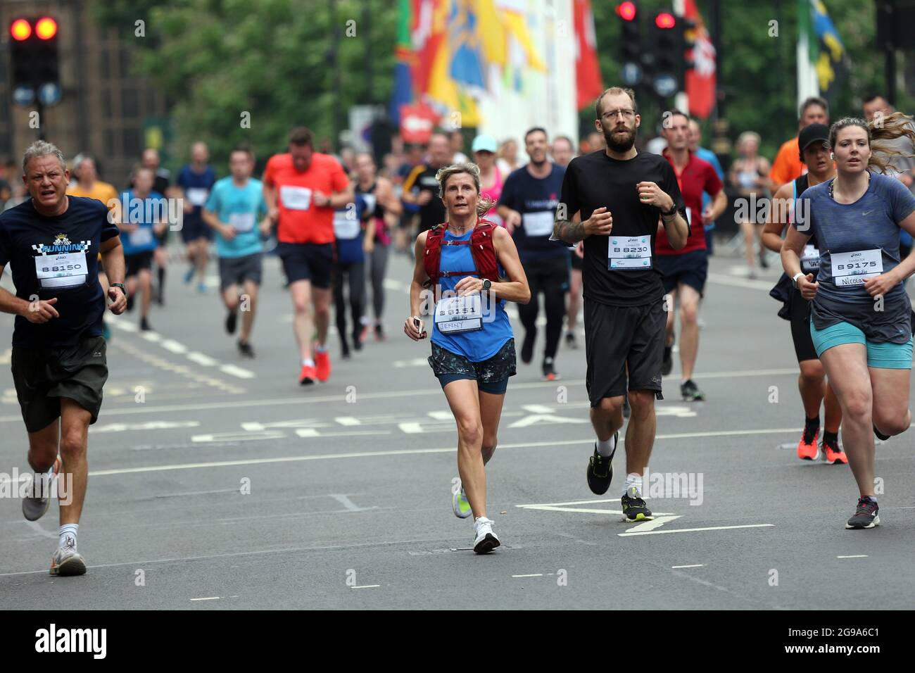 London, England, UK. 25th July, 2021. Runners in central London during ...