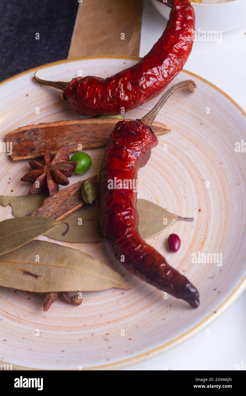dry red chili isolated on light background. indian spices Stock Photo ...