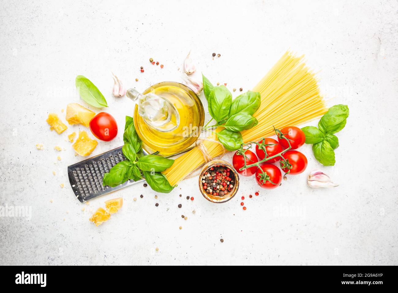 Pasta background. Several types of dry pasta with vegetables and herbs ...