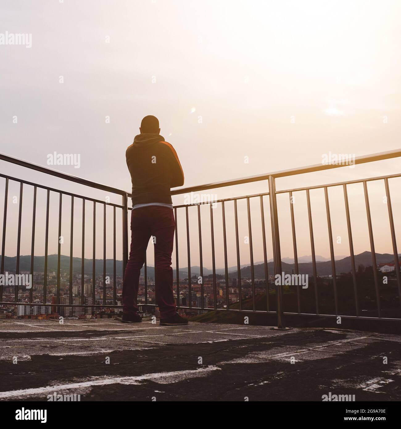 Male watching city landscape hi-res stock photography and images - Alamy
