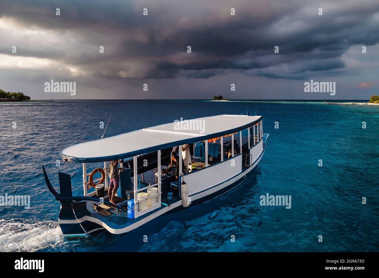 Wooden boat in Indian Ocean Stock Photo - Alamy