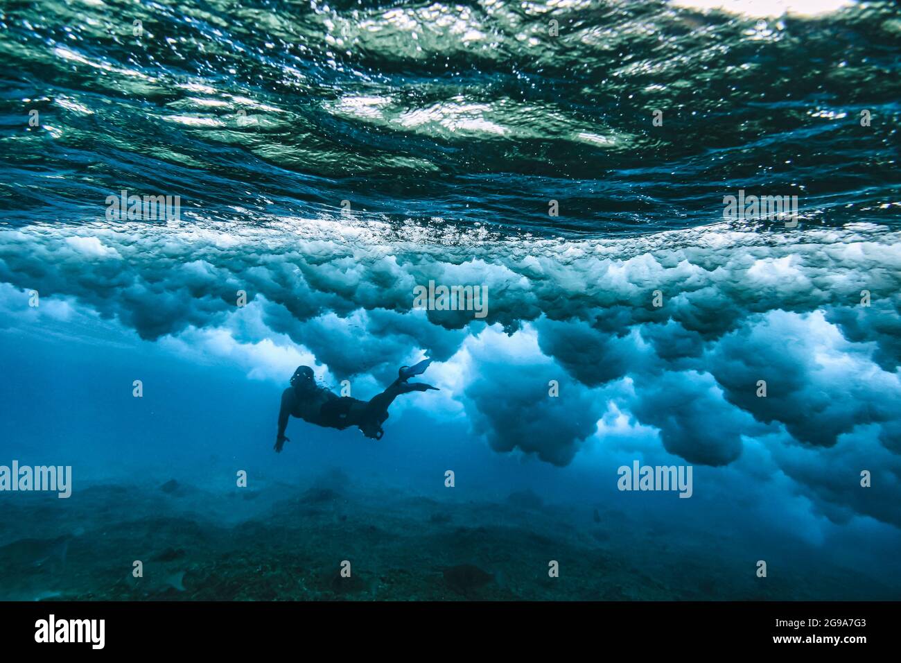 Man swimming underwater, wave underwater Stock Photo - Alamy