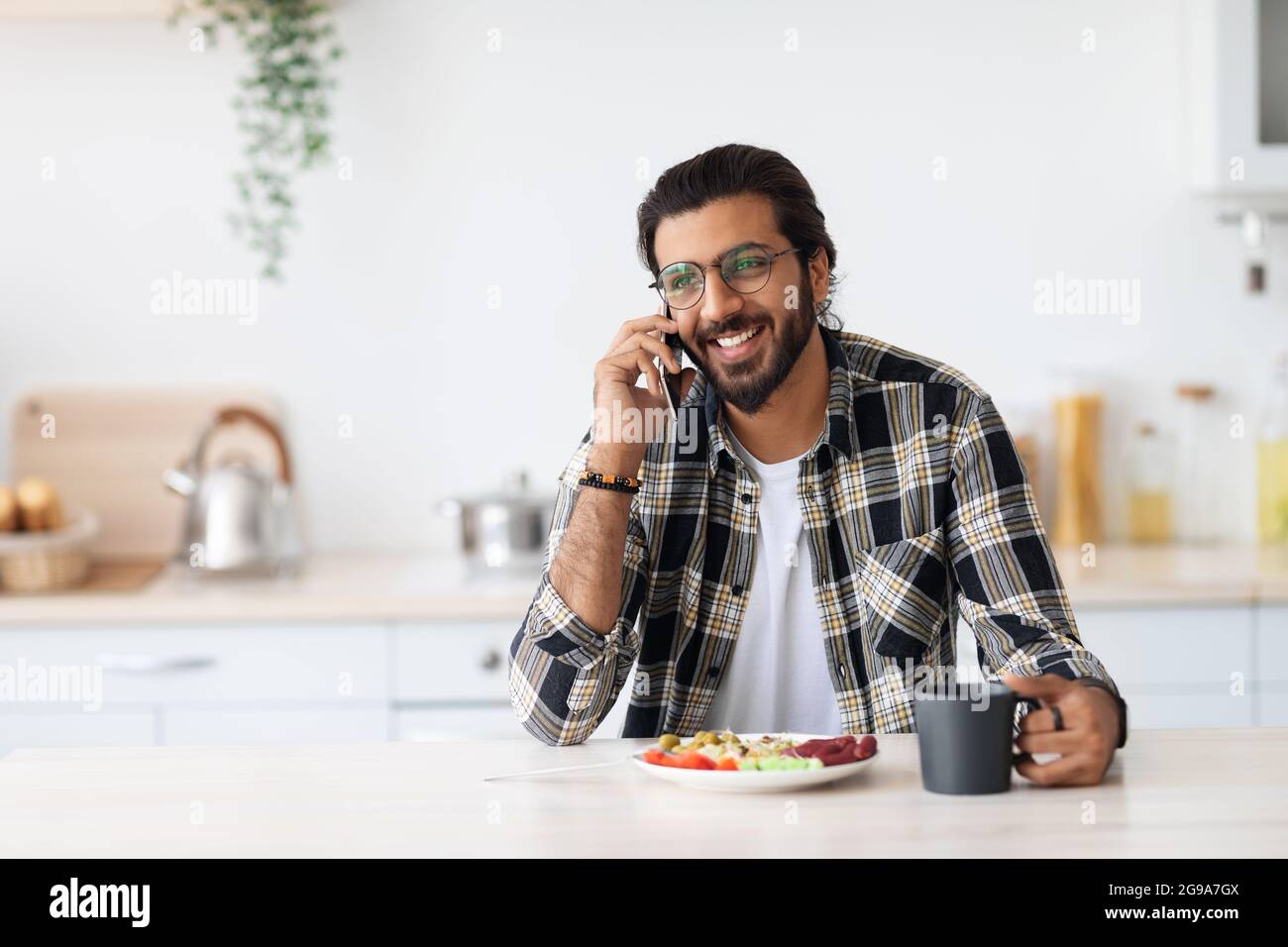 Indian man eating home hi-res stock photography and images - Alamy