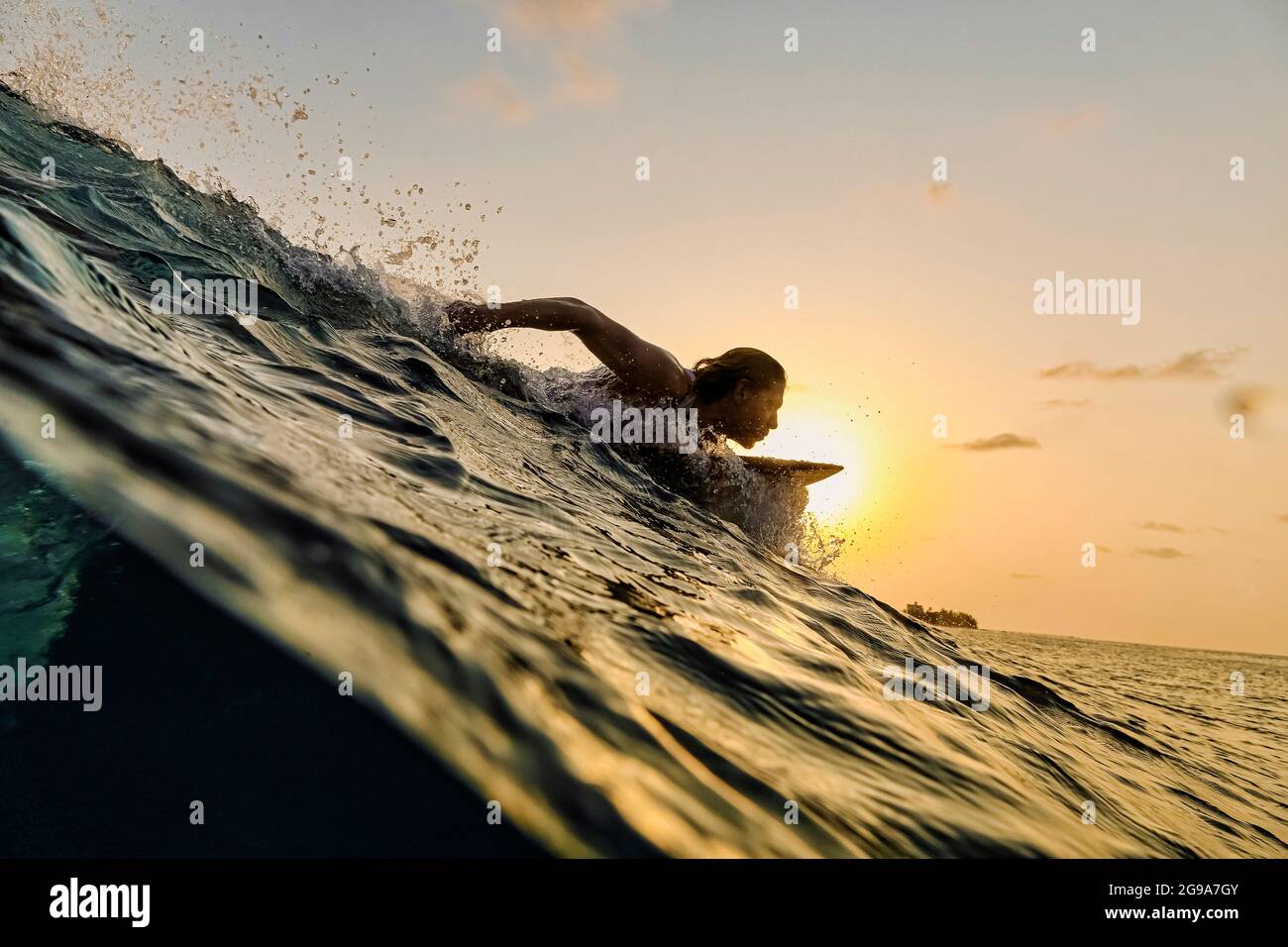 Male surfer in ocean hi-res stock photography and images - Alamy