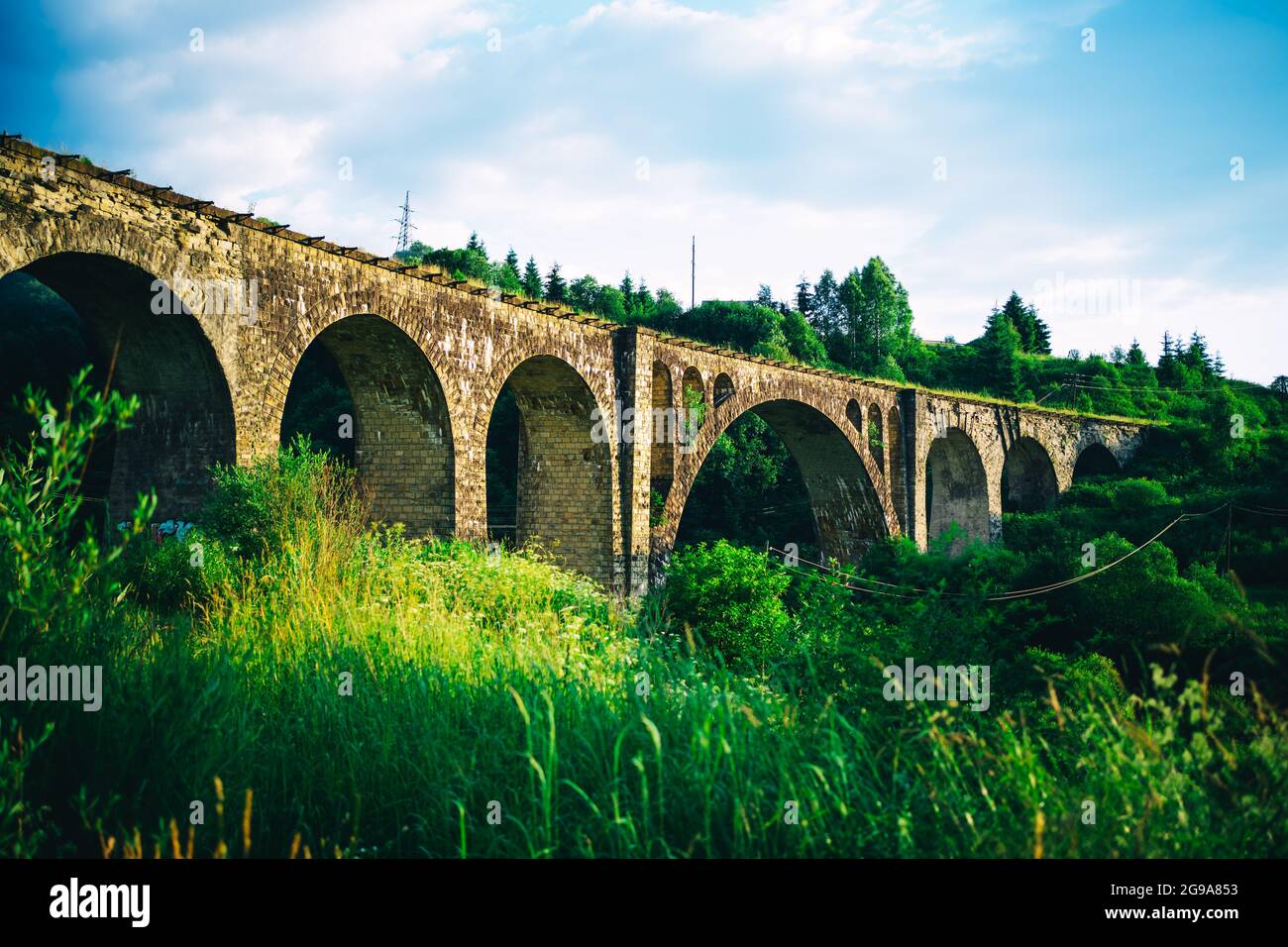 ancient stone viaduct in the rays of the setting sun Stock Photo - Alamy