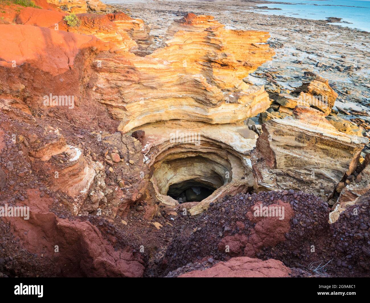 Sandstone rock hole created by erosion, Reddell Beach, Broome ...